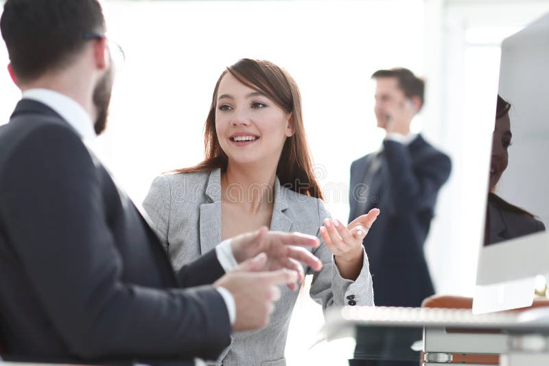 Client Talking with the Staff at the Desk in the Office Stock Photo ...