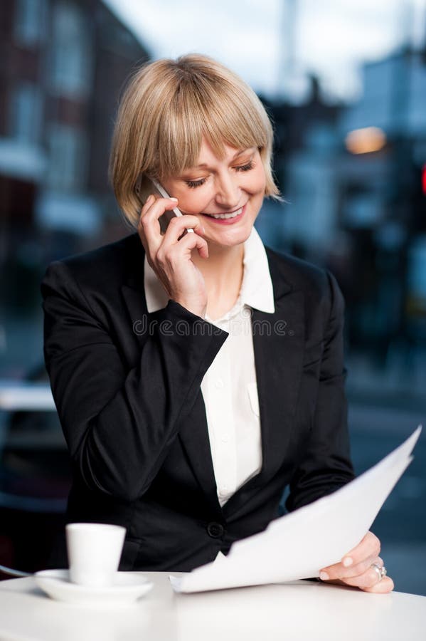 Manager Communicating Via Cell Phone in Cafe Stock Photo - Image of ...