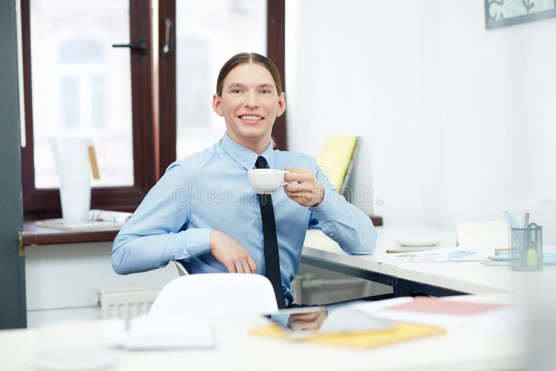 Manager with cup of tea stock image. Image of professional - 100141661