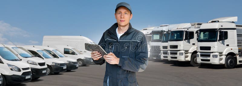 Manager with a Digital Tablet Next To Trucks. Stock Image - Image of ...