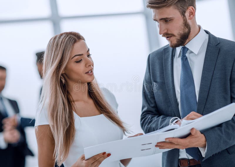 Manager Discussing with the Client the Business Document Stock Photo ...