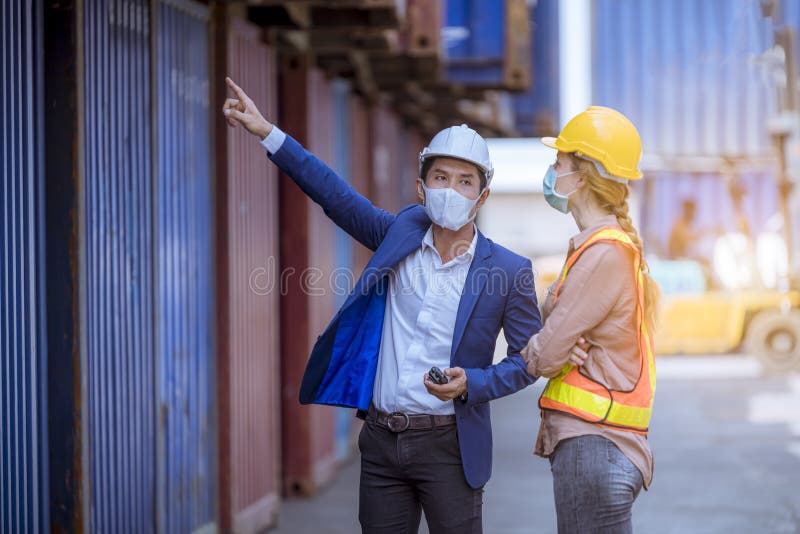 Manager and Dock Worker Under Discussion about Dock Container Shipping ...