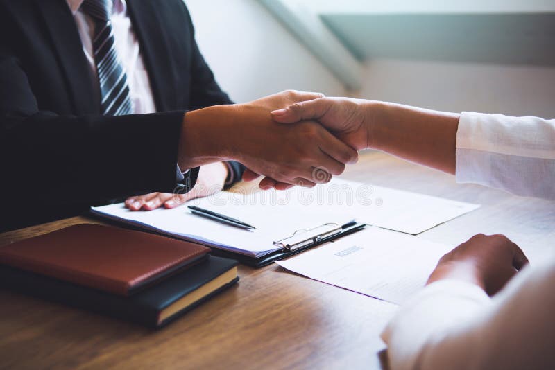 Manager and Employee Interview Concept with Handshake after Talking ... Manager and Employee Interview Concept with Handshake after Talking ...