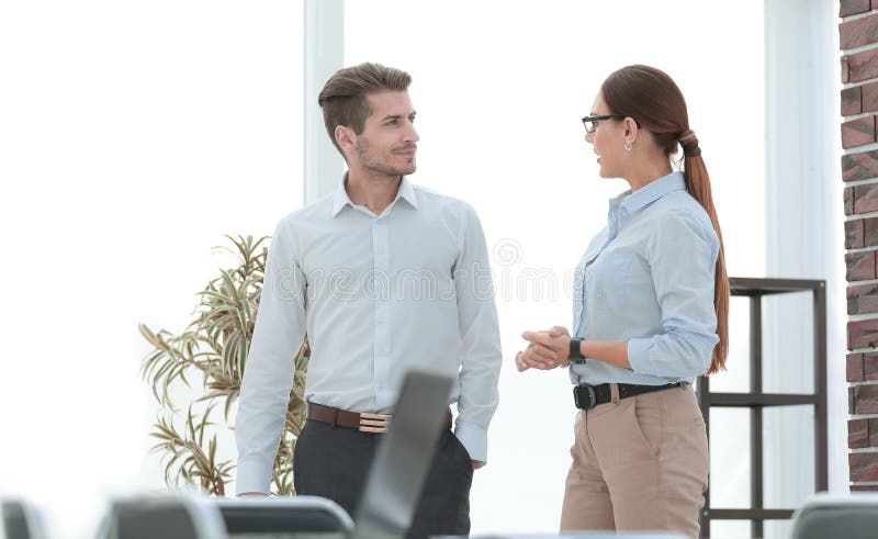 Manager and Employee Talking Standing in the Office Stock Photo - Image ...