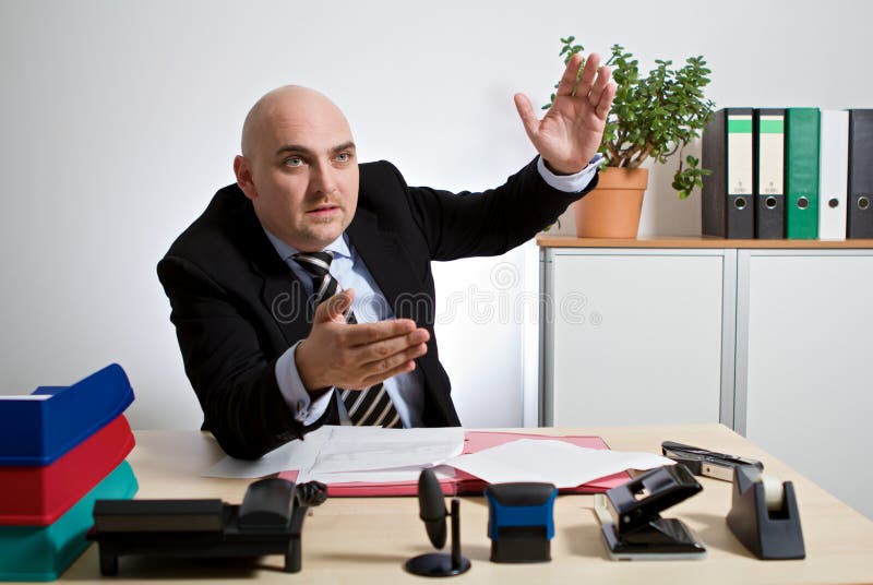 Manager Explains with Hectic Gestures a Situation Stock Photo - Image ...