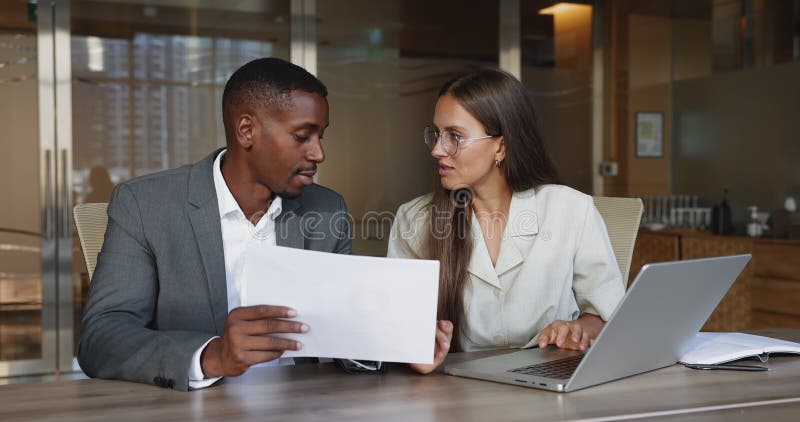 Manager Explains Specific Points or Terms To Client from Contract Stock ...