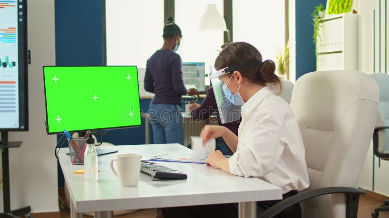 Manager with Face Mask Typing on Computer with Green Screen Stock ...