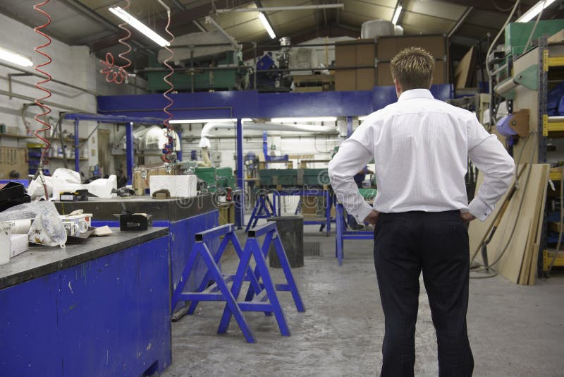 Manager on factory floor stock photo. Image of workforce - 14219484