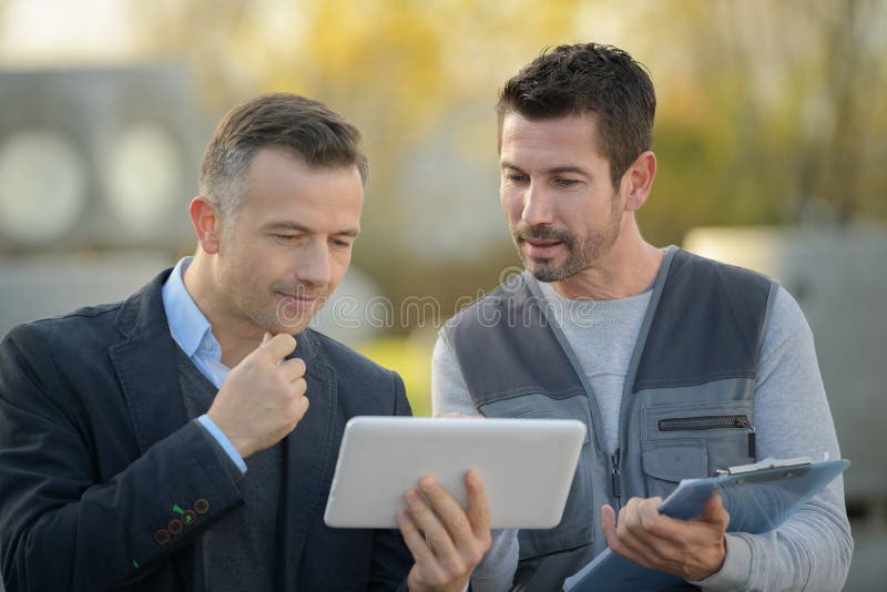Manager on factory floor stock photo. Image of workforce - 14219484