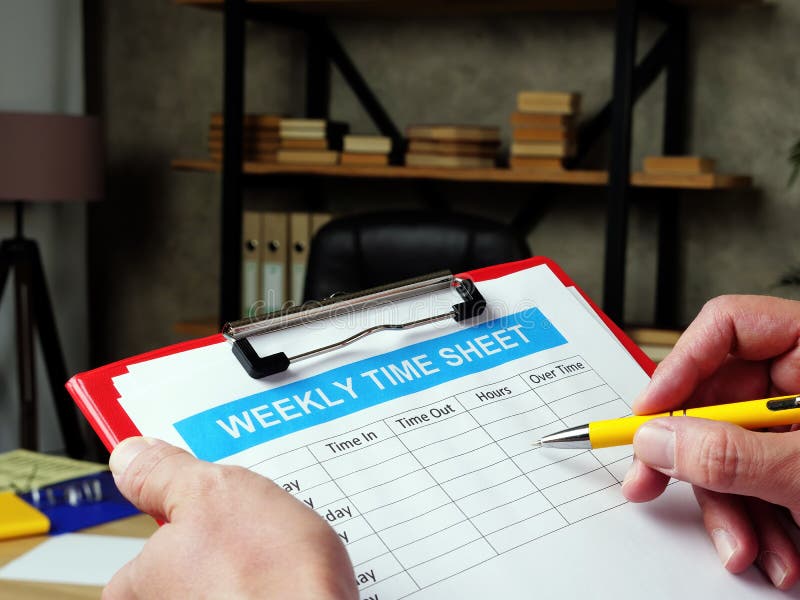 The Manager Fills in the Weekly Time Sheet. Stock Photo - Image of ...