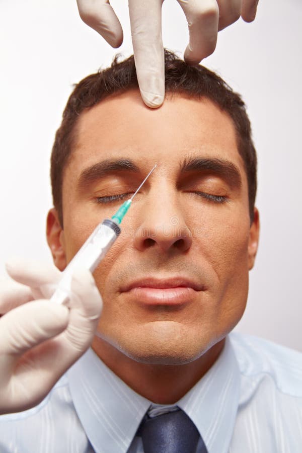 Manager Getting Needle in Forehead Stock Image - Image of pain ...