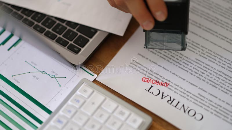 Manager Hand Putting Stamp Approved on Contract Document Form in Office ...