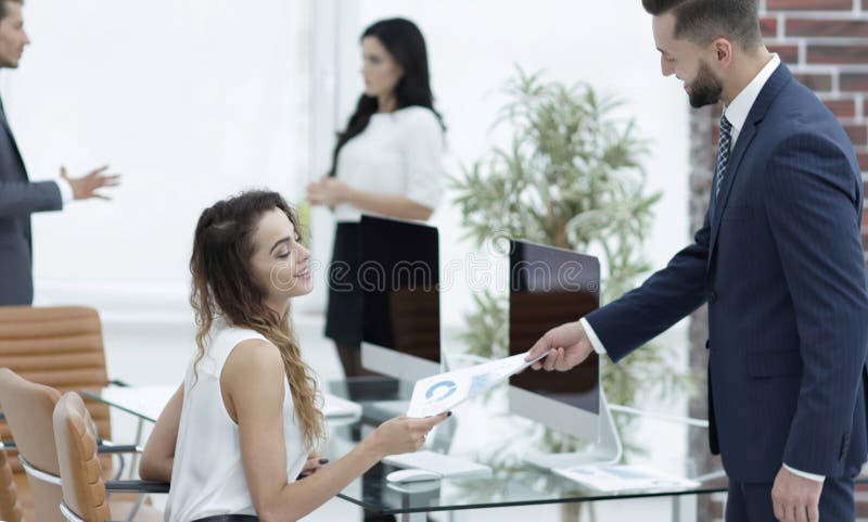 Manager Handing the Employee the Document Stock Photo - Image of adult ...