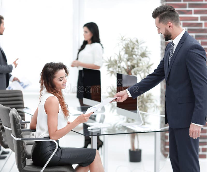 Manager Handing the Employee the Document Stock Photo - Image of ...