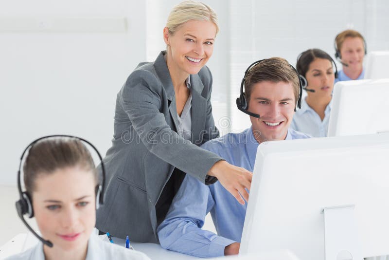 Manager Helping Call Centre Employee Stock Image - Image of portrait ...