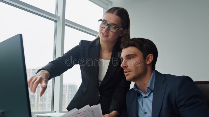 Manager Helping Office Employee Analysing Financial Data. Friendly ...