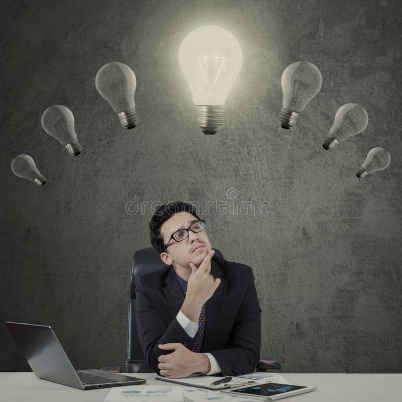 Manager with Illuminated Light Bulb Stock Photo - Image of financial ...