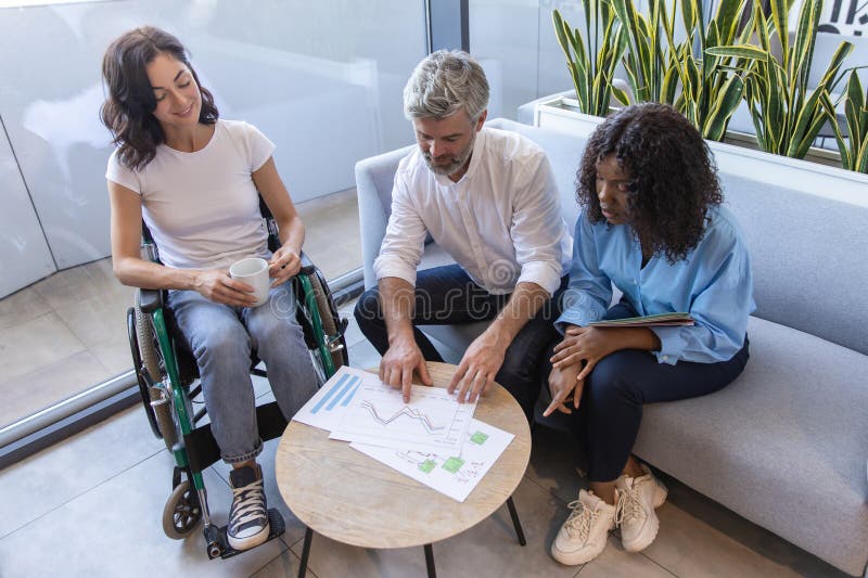 Manager Leading Planning Session with Diverse Colleagues Showcasing ...