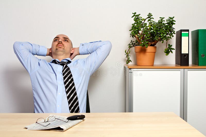 Manager leans back relaxed stock photo. Image of success - 68491174
