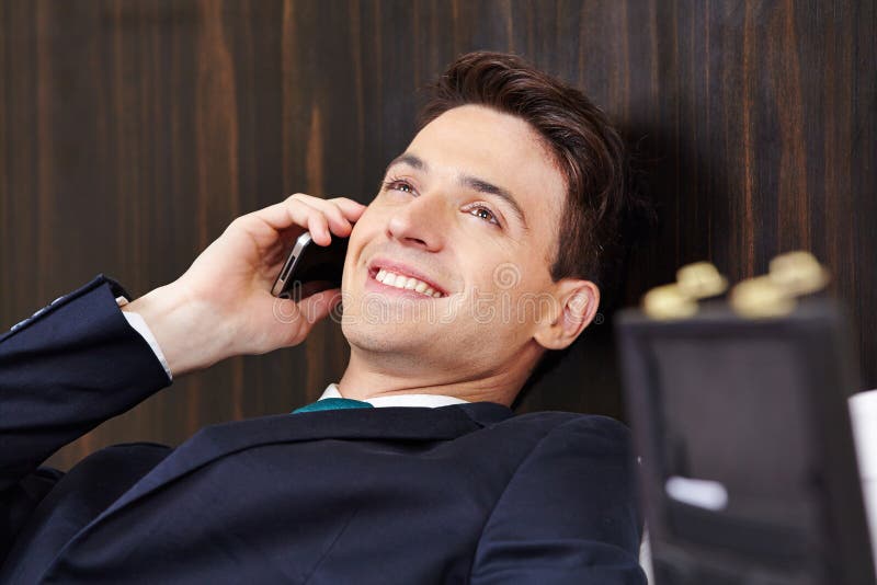 Manager Making Phone Call in Hotel Room Stock Photo - Image of calling ...