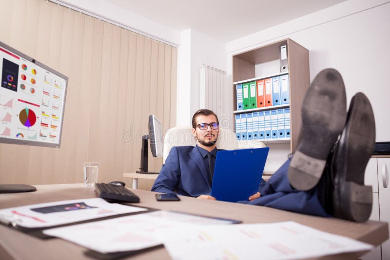 Manager in Office with His Feet on the Table Stock Photo - Image of ...