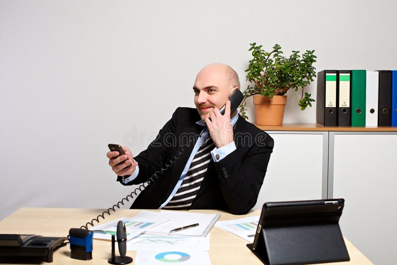 Manager on the Phone at Office Stock Photo - Image of keyboard, desktop ...