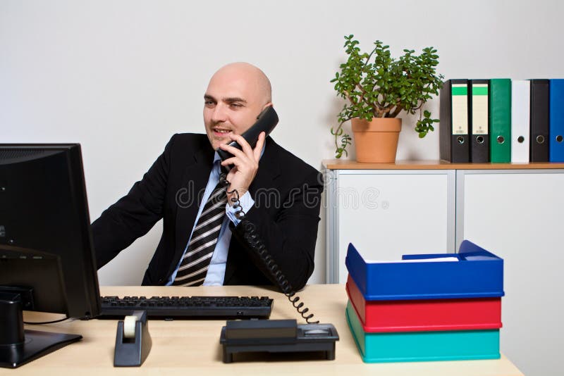 Manager on the Phone at Office Stock Photo - Image of keyboard, desktop ...