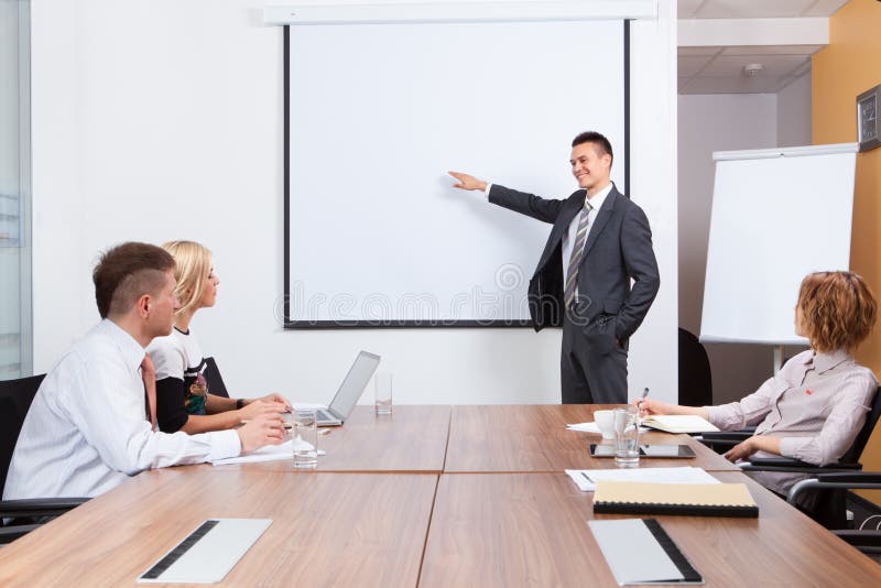 Manager Presenting Whiteboard To His Colleagues Stock Image - Image of ...