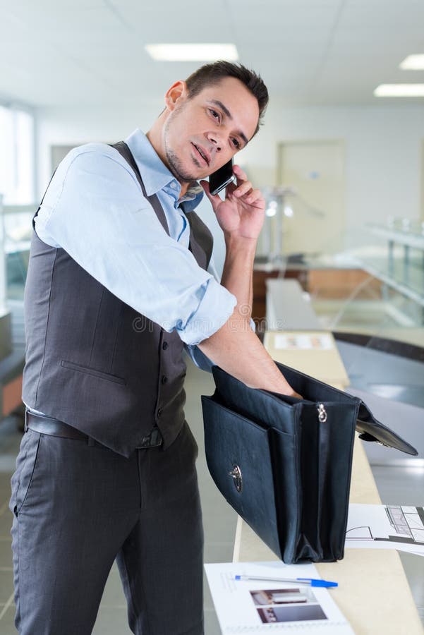 Manager Presents Looking Inside Bag Stock Image - Image of phone ...