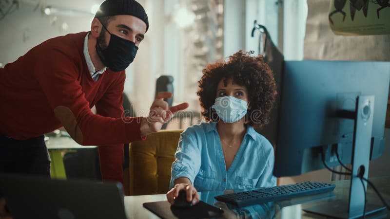 Manager and Programmer Wearing Face Masks, Talk, Solve Problems, Use ...