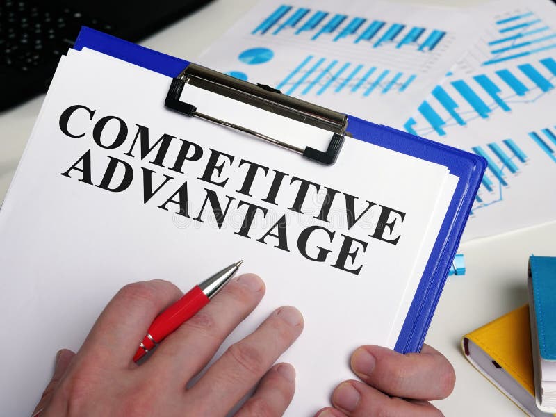Manager Reads about Competitive Advantage in Business. Stock Image ...