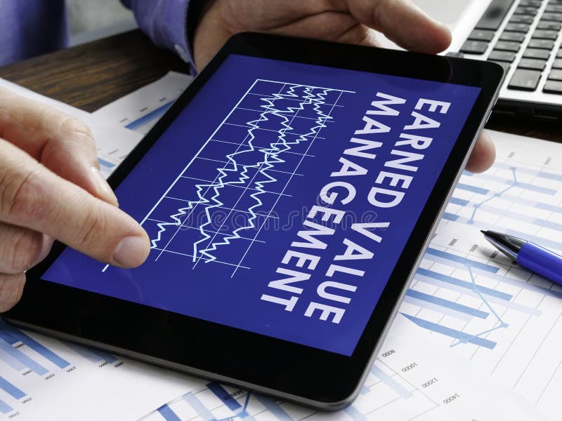 Manager Reads Earned Value Management EVM Report. Stock Image - Image ...