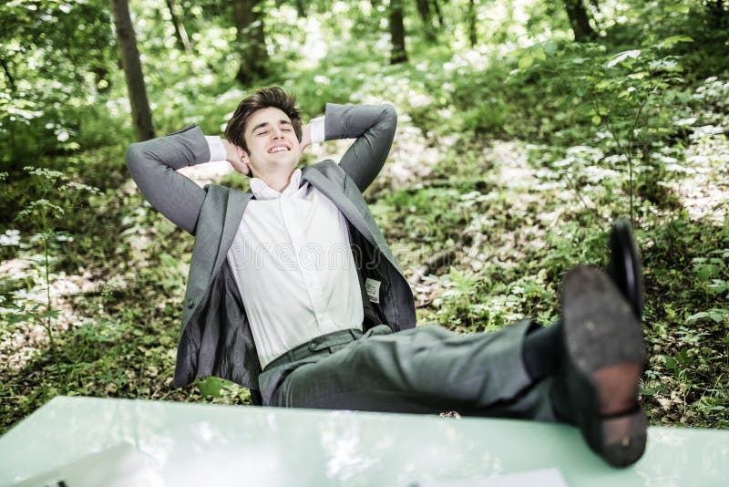 Manager Relaxed at Office Table in Green Forest. Business Concept ...