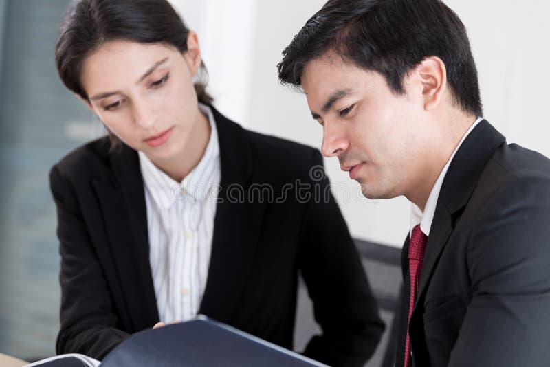 A Manager and Secretary Working Together in the Office Stock Image ...