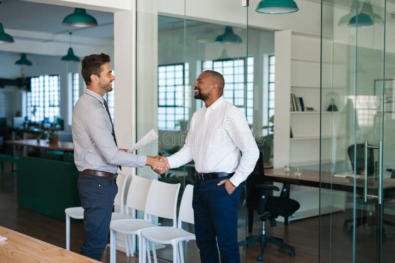 Manager Shaking Hands with a Job Applicant after an Interview Stock ...