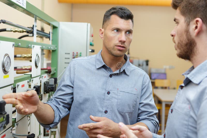 Manager Showing Machine To Be Maintained Stock Photo - Image of factory ...