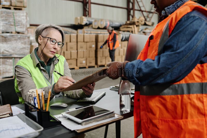Manager Signing Delivery Documents in Warehouse Stock Image - Image of ...