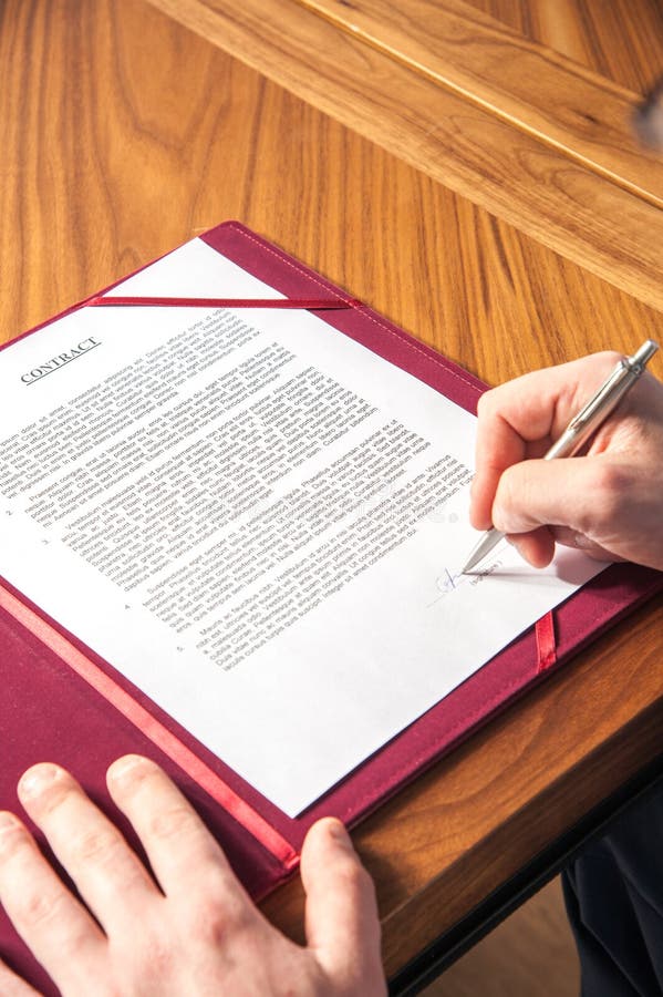 The Manager Signs the Official Contract on the Parties` Agreement Stock ... The Manager Signs the Official Contract on the Parties` Agreement Stock ...