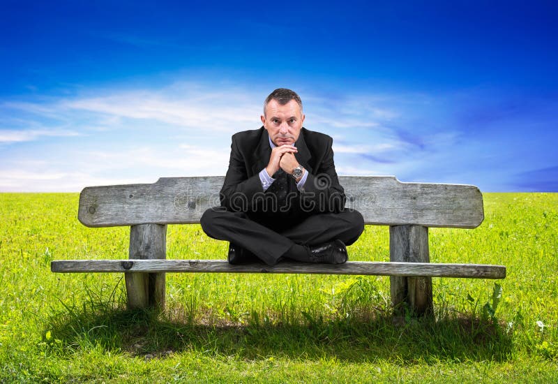 Manager sitting on a bench stock photo. Image of outside - 101934698