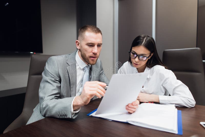 Manager Sitting at Desk, Secretary Bringing Contract To Sign. Stock ...