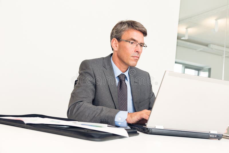 Manager Sitting at His Desk Stock Photo - Image of office, newton: 89747690