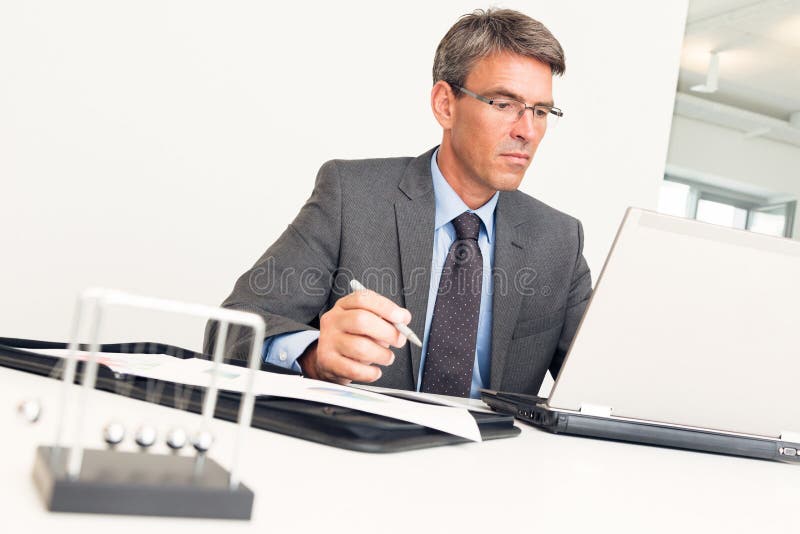 Manager Sitting at His Desk Stock Photo - Image of office, newton: 89747690