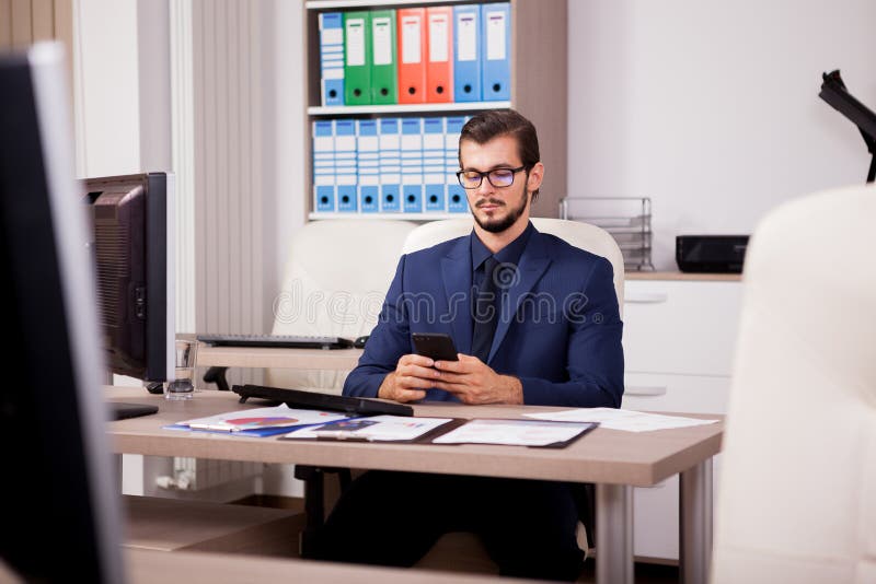 Manager with Smartphone and His Team. Leadership Stock Photo - Image of ...