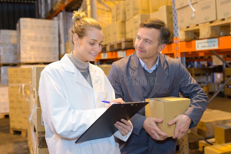 Manager Standing in Front Warehouse Worker in Warehouse Stock Image ...
