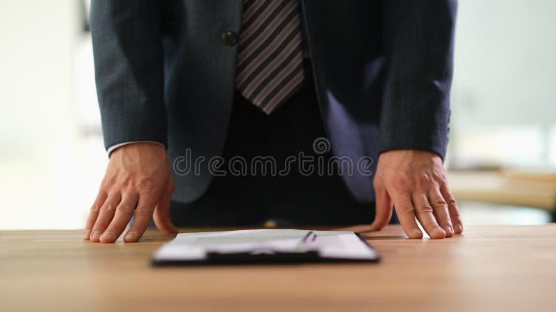 Manager Standing at Table with Documents at Business Conference Closeup ...