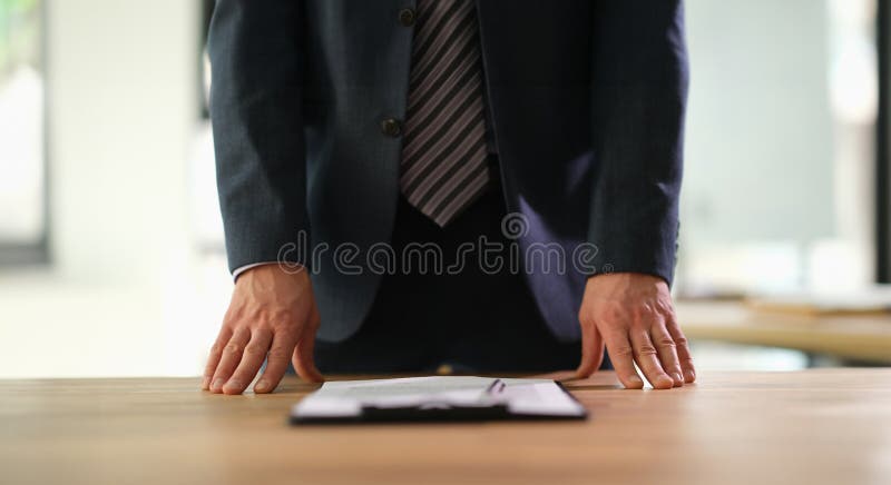 Manager Standing at Table with Documents at Business Conference Closeup ...
