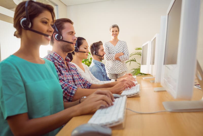 Manager Supervising Work in Call Center Stock Photo - Image of monitor ...