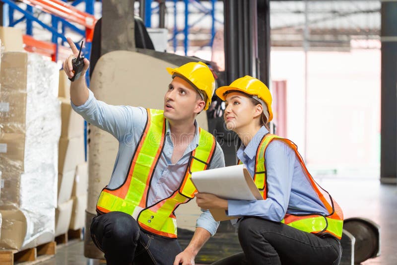 Manager and Supervisor Taking Inventory in Warehouse, Foreperson Making ...