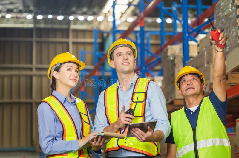 Manager and Supervisor Taking Inventory in Warehouse, Foreperson Making ...