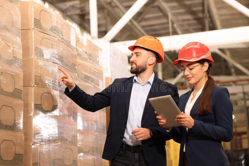 Manager and Supervisor at Warehouse. Logistics Center Stock Photo ...